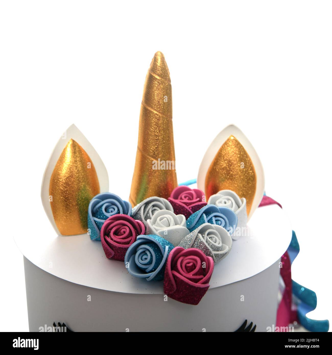 Details of Unicorn cake with pink frosting to side wafer paper cakes. Cakes with wafer paper ...