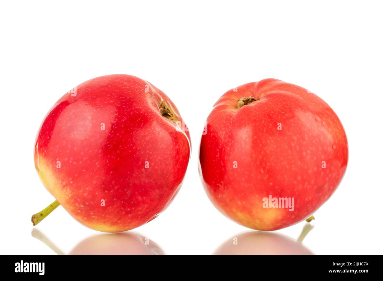 Two red sweet apples, close-up, on a white background Stock Photo - Alamy