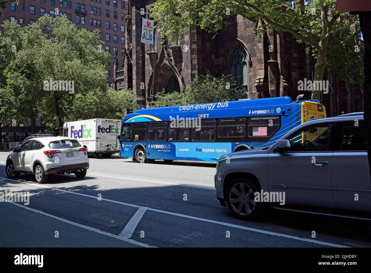 New York, NY, USA - July 25, 2022: A modern hybrid NYC bus with the ...