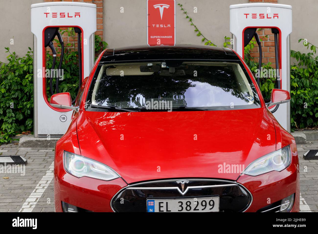 Poznan, Poland. 26 Jul 2022: Red Tesla Motors electric cars parked at ...