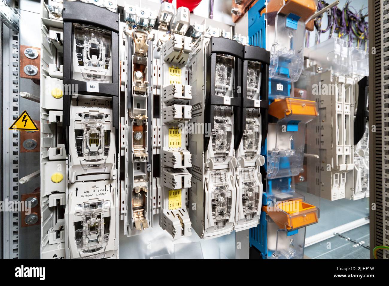 A closeup shot of an electrical switchboard with fuses and wires Stock ...