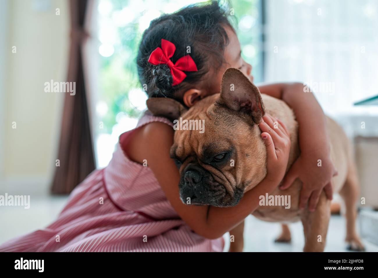 Southeast asian girl and dog hi-res stock photography and images - Alamy