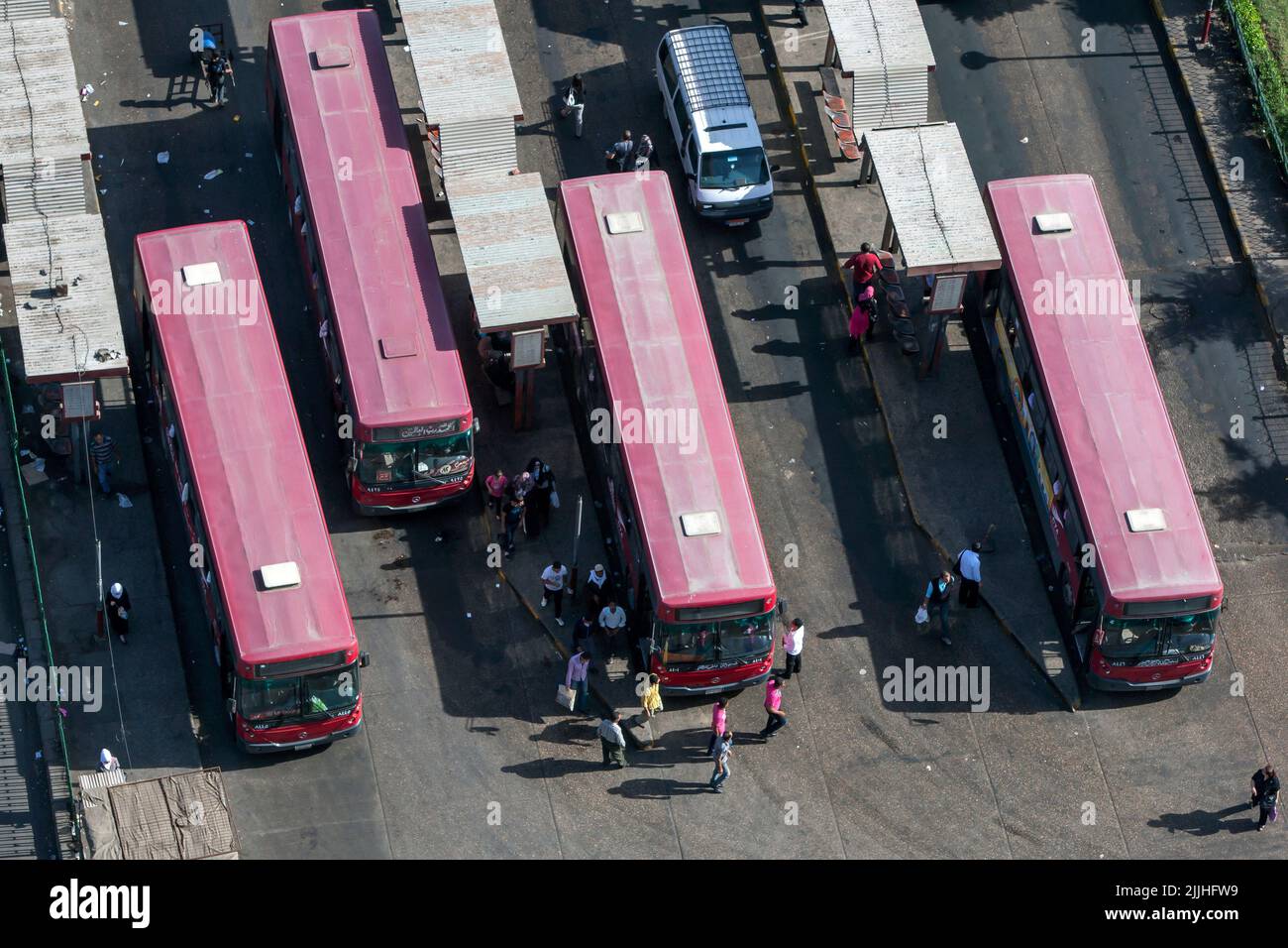 CAIRO, EGYPT - MAY 15, 2013 : Transit buses sit at the station adjacent ...