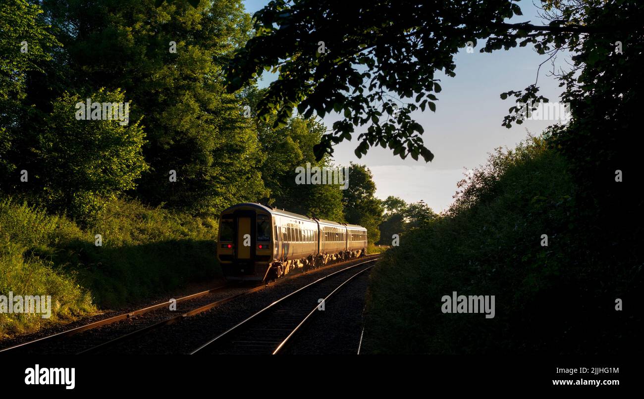 Northern Rail class 158 sprinter train heading into the sunset on the ...