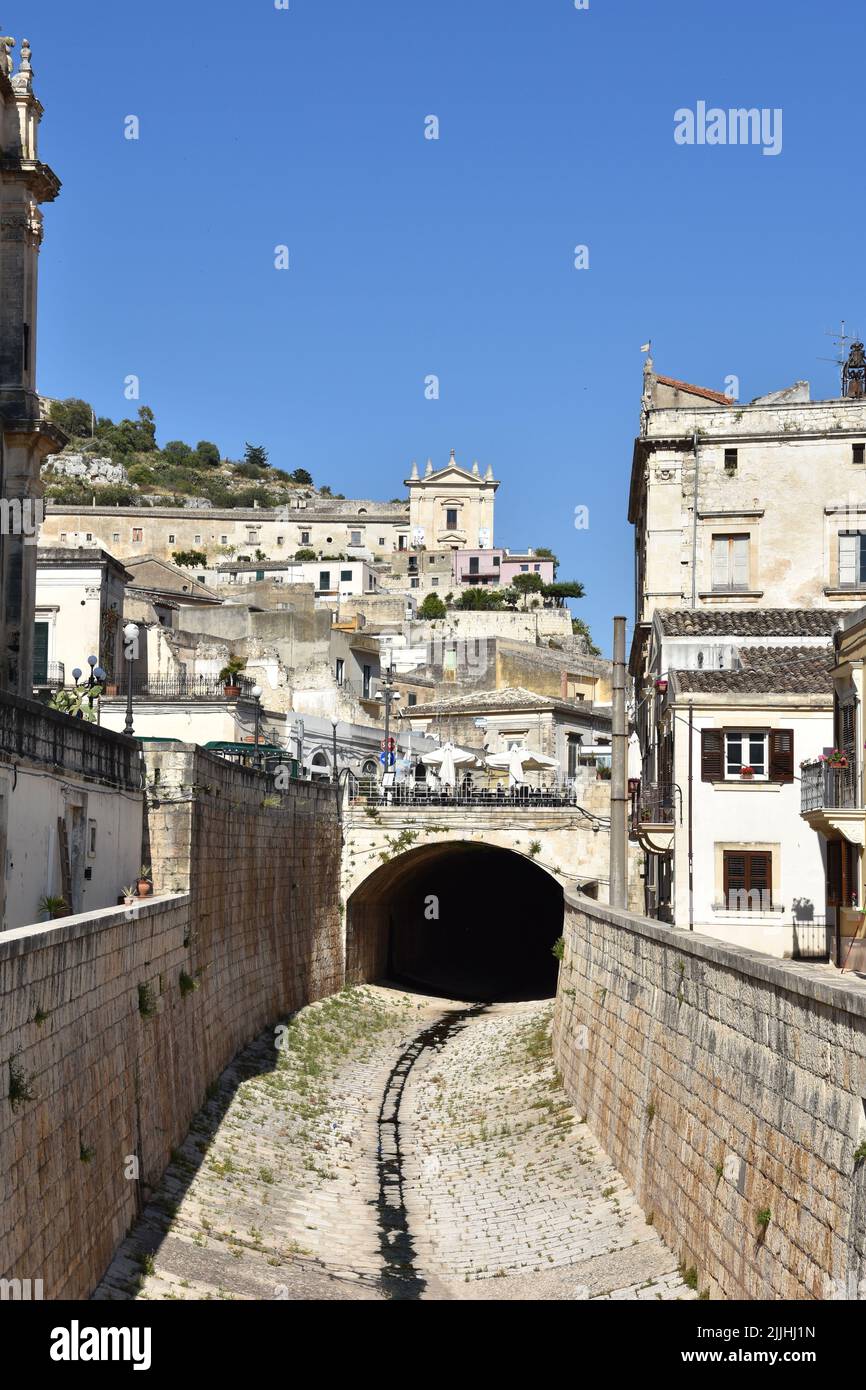 A vertical shot of the old architecture and empty bridge in Sicily ...
