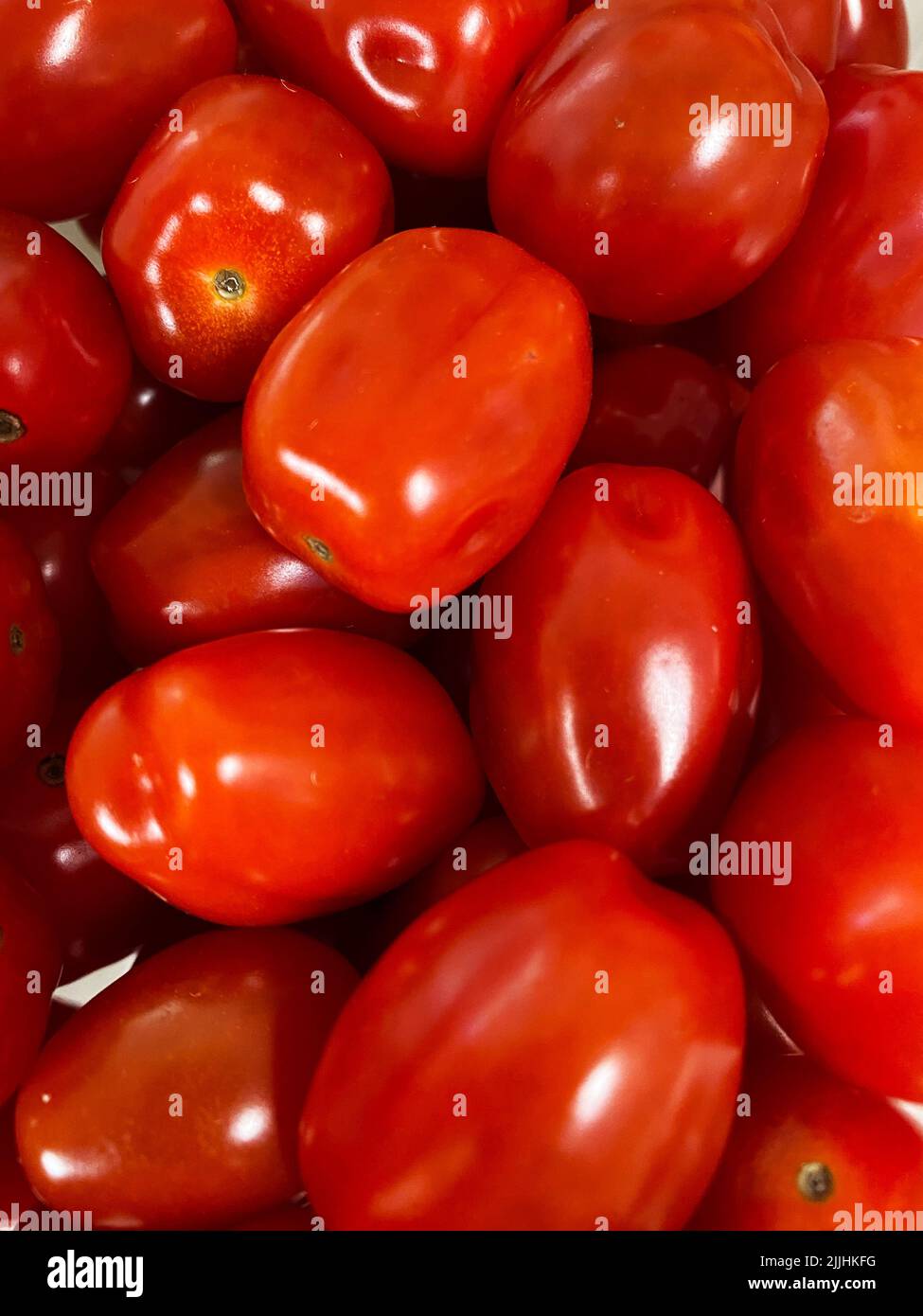 Red cherry tomatoes Stock Photo - Alamy