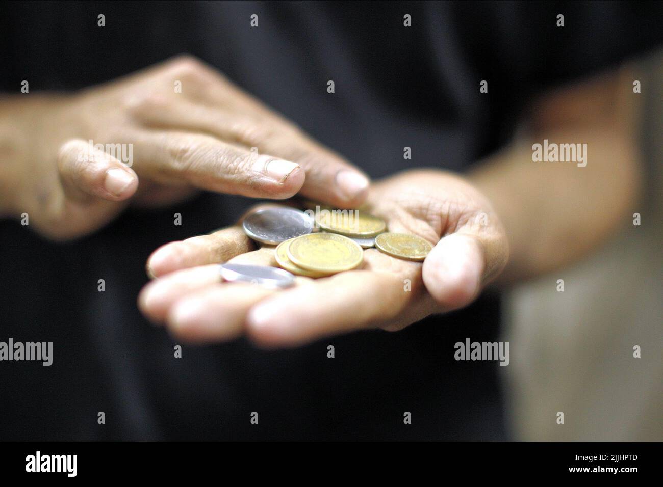 COINS IN HAND, 7 BOXES, 2012 Stock Photo - Alamy