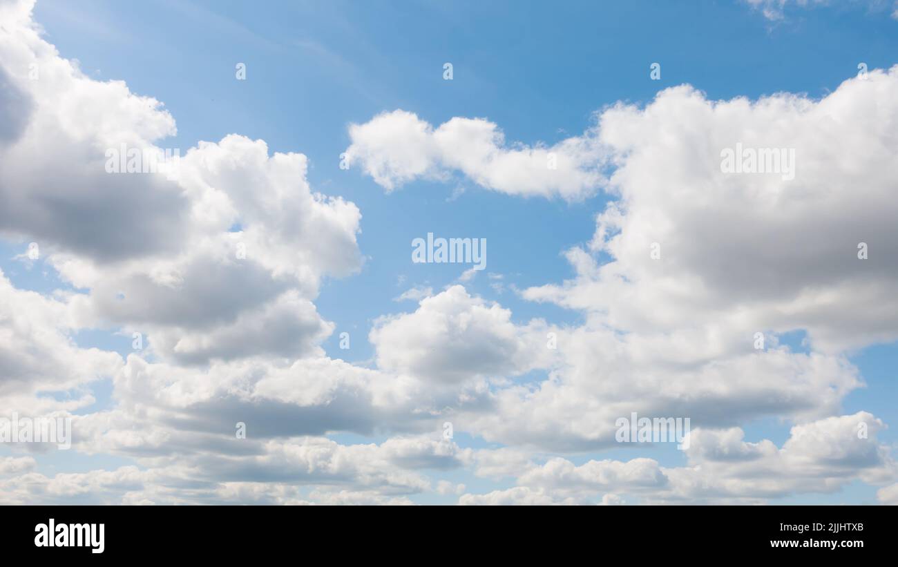 Large blue sky and white clouds hi-res stock photography and images - Alamy