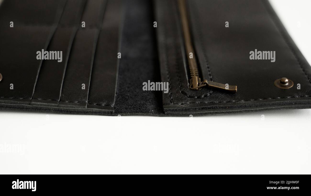 Details of man's handmade wallet on a white surface. Wallet made of ...