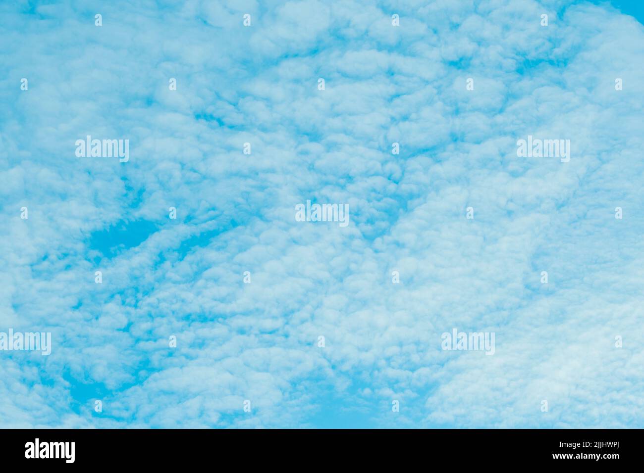 Altocumulus sky air weather blue background high cloudy atmosphere Stock Photo - Alamy