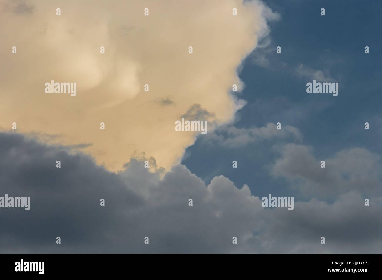 Gray and color clouds cover the dark blue sky weather change bad ...