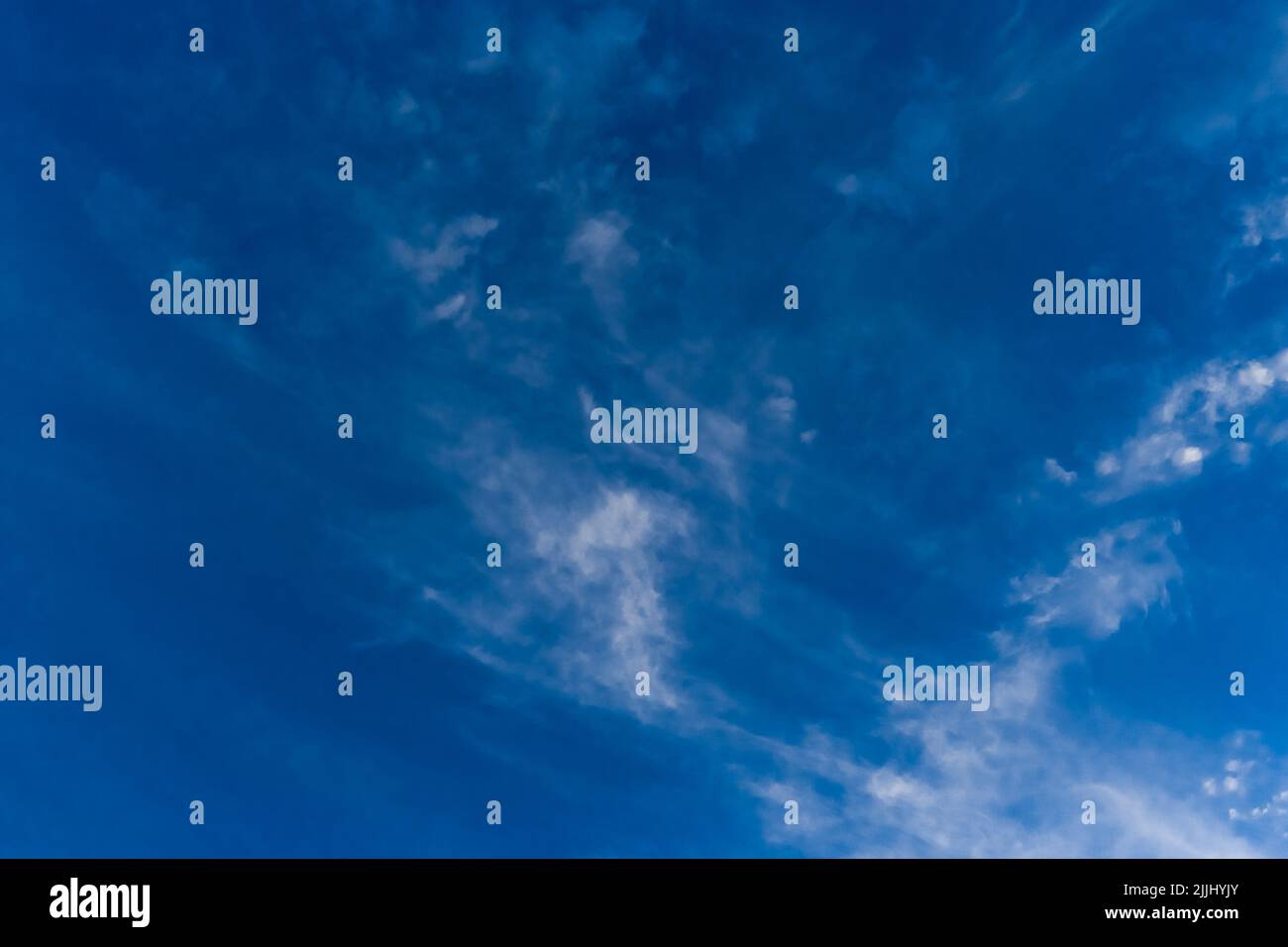 White clouds mild windy weather nature background sky Stock Photo - Alamy