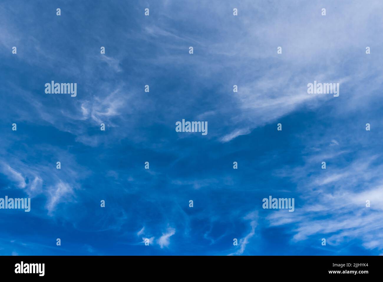 White clouds mild windy weather nature background sky Stock Photo - Alamy