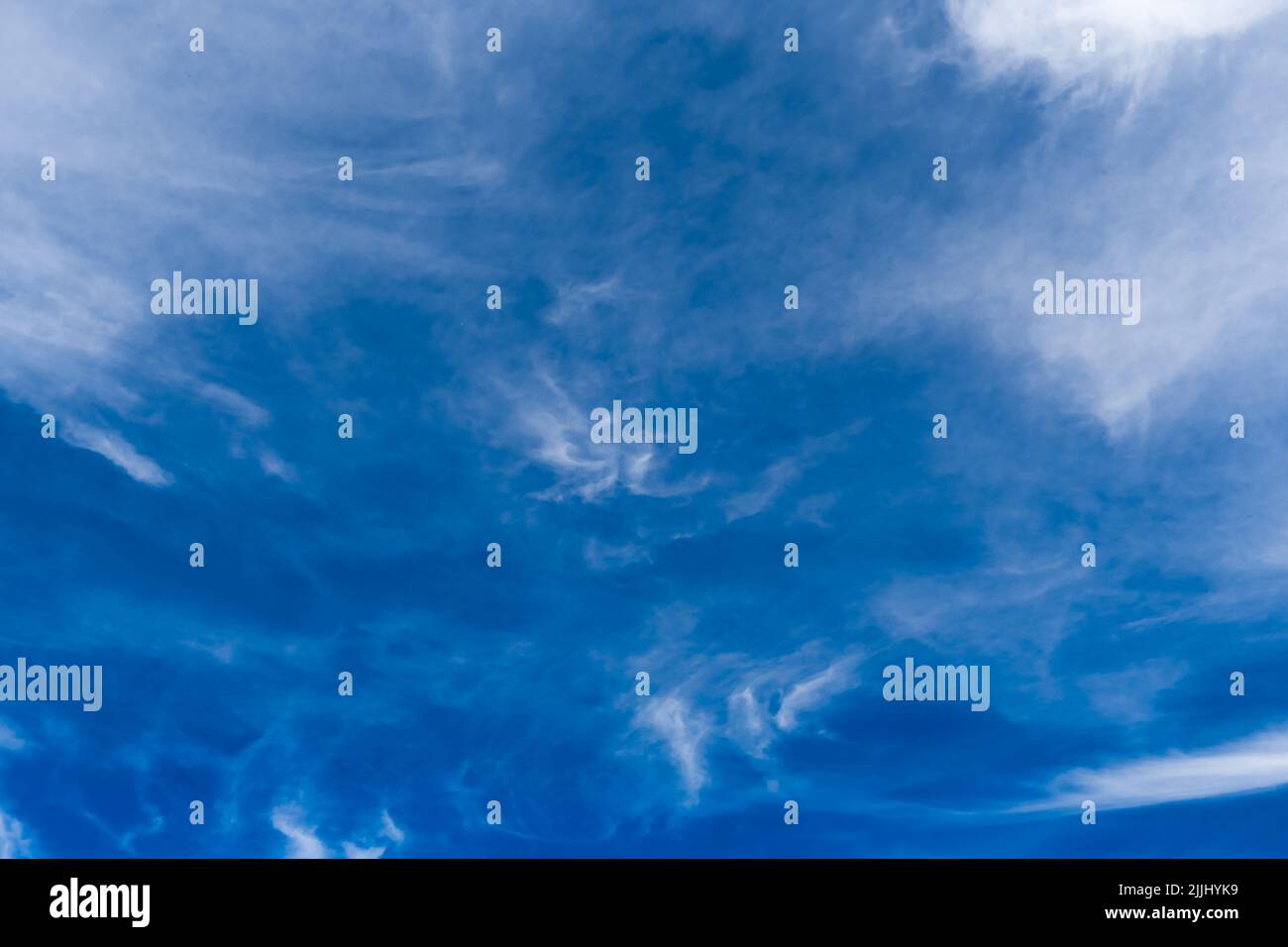 White clouds mild windy weather nature background sky Stock Photo - Alamy