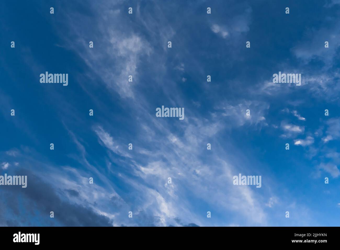 White clouds mild windy weather nature background sky Stock Photo - Alamy