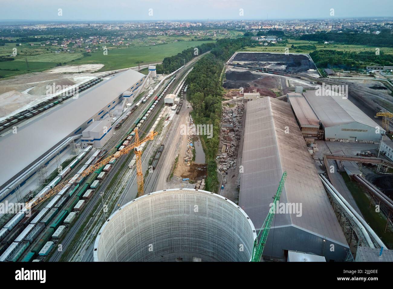 Aerial view of cargo train cars loaded with construction goods at ...