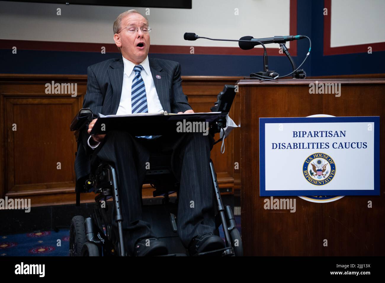 Representative Jim Langevin (D-R.I.) speaks to guests during a ...