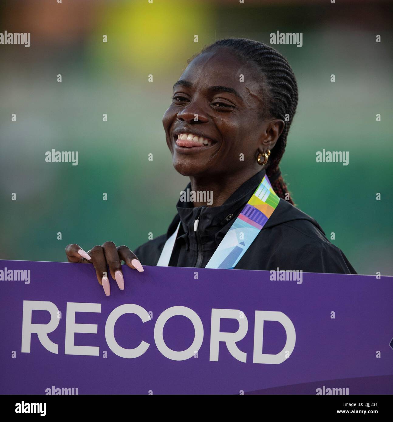 Tobi Amusan (NGR) receives a check for a $100,000 for a world record in ...