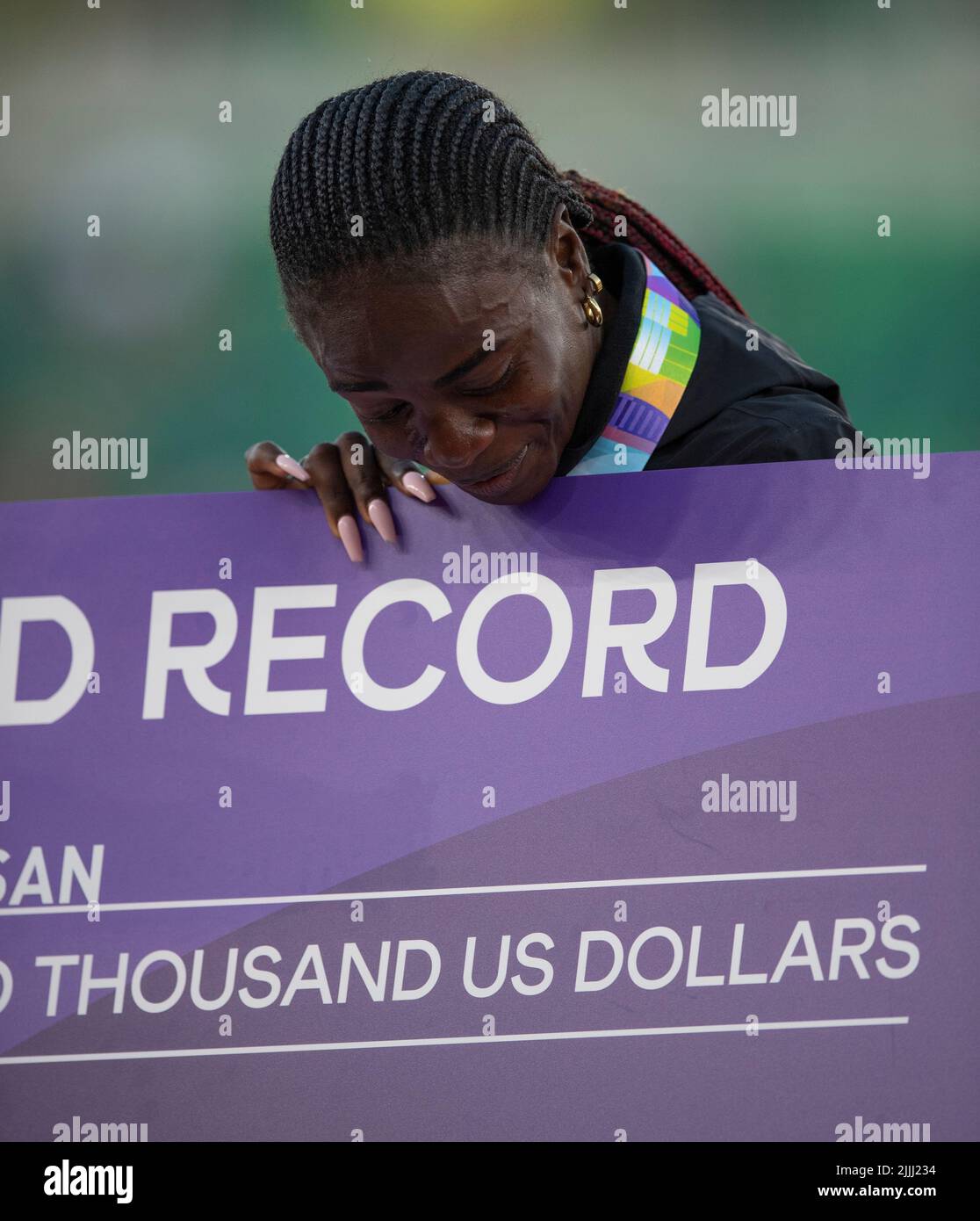 Tobi Amusan (NGR) receives a check for a $100,000 for a world record in ...