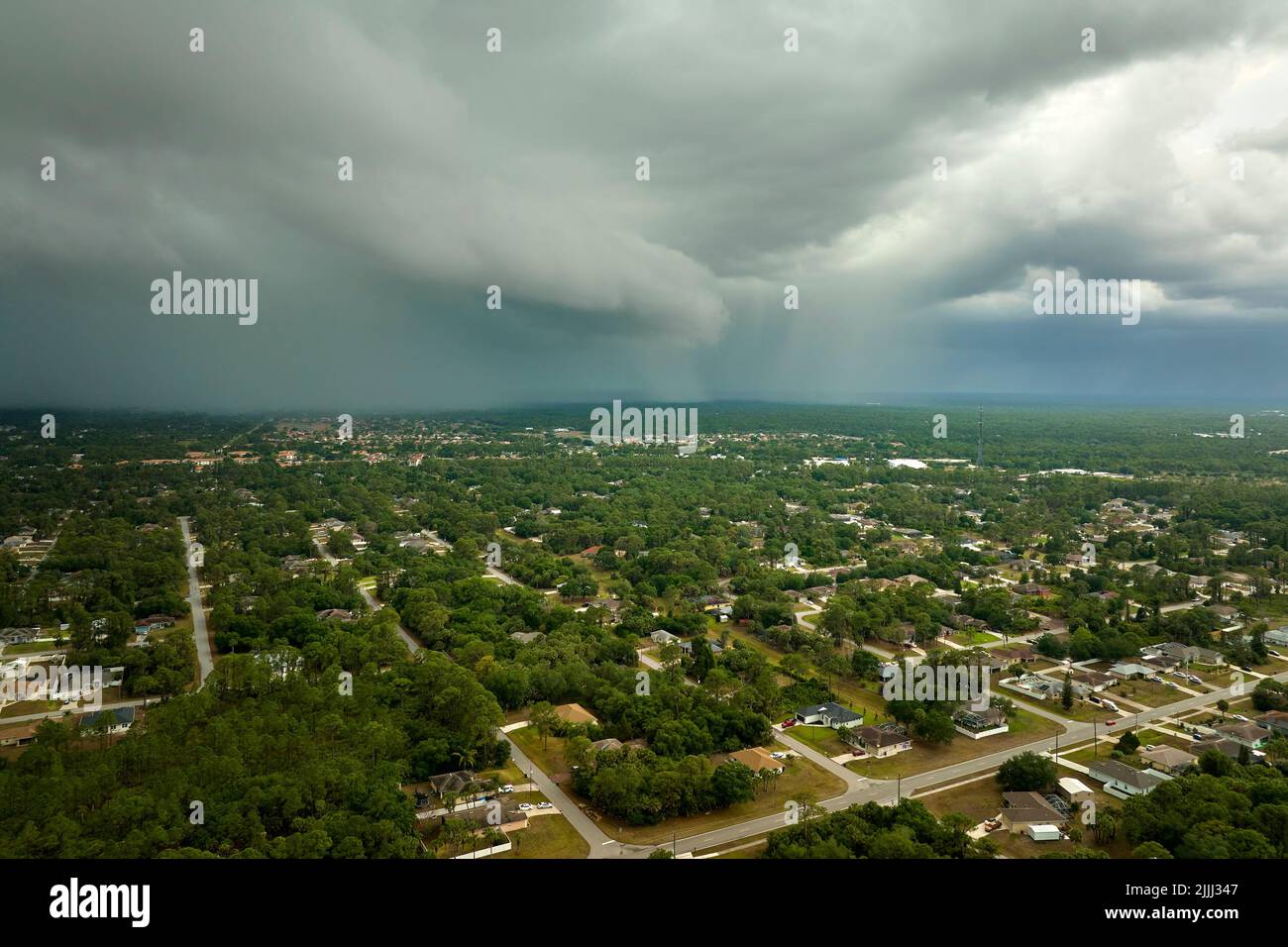 Dark stormy clouds forming on gloomy sky before heavy rainfall over ...