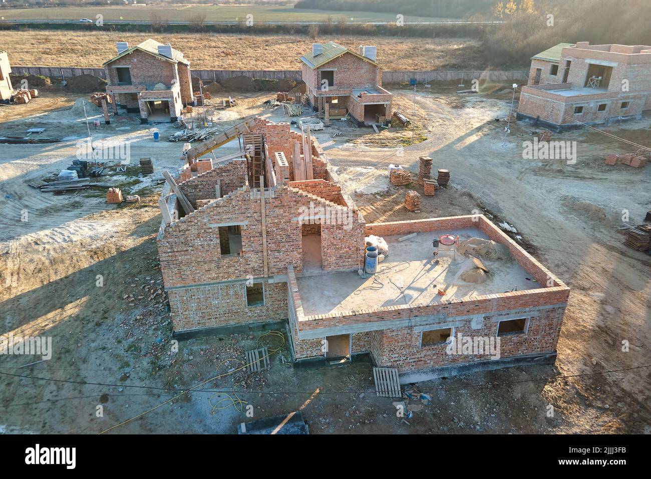 Industrial building site in rural area with residential houses under ...
