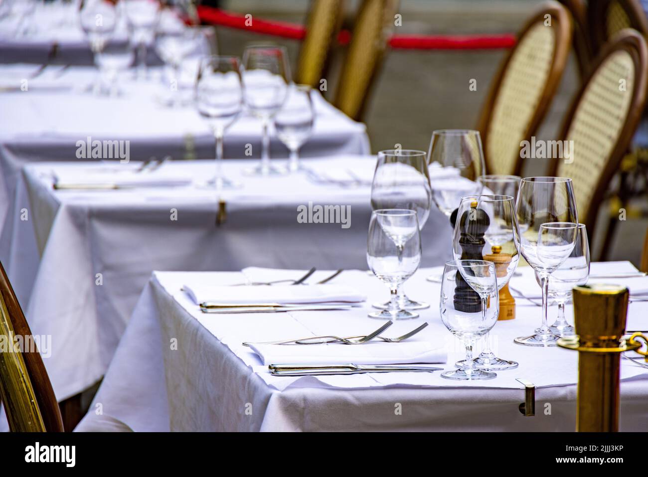 Table in an open air restaurant Stock Photo - Alamy