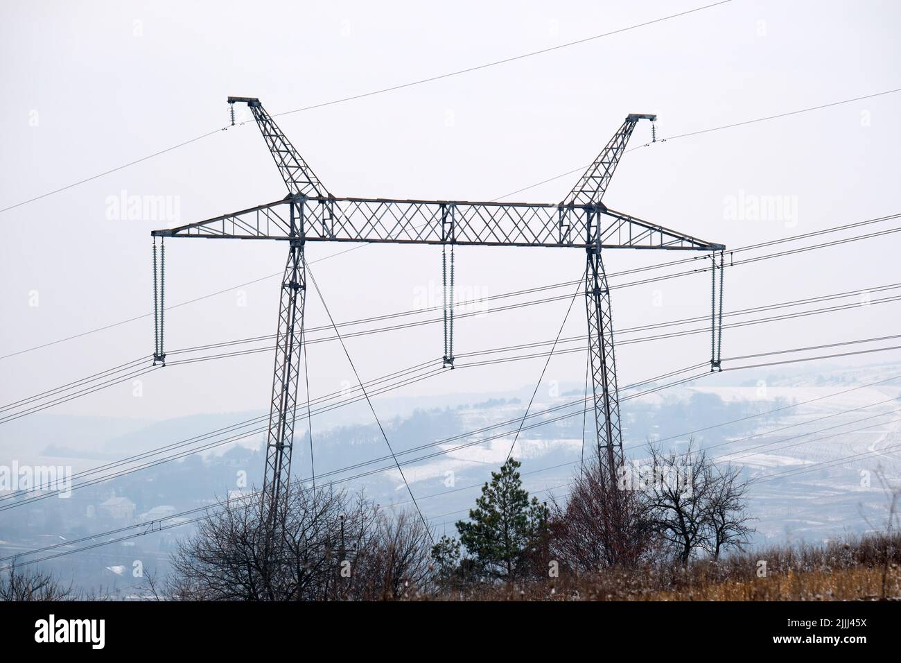 Steel pillar with high voltage electric power lines delivering ...