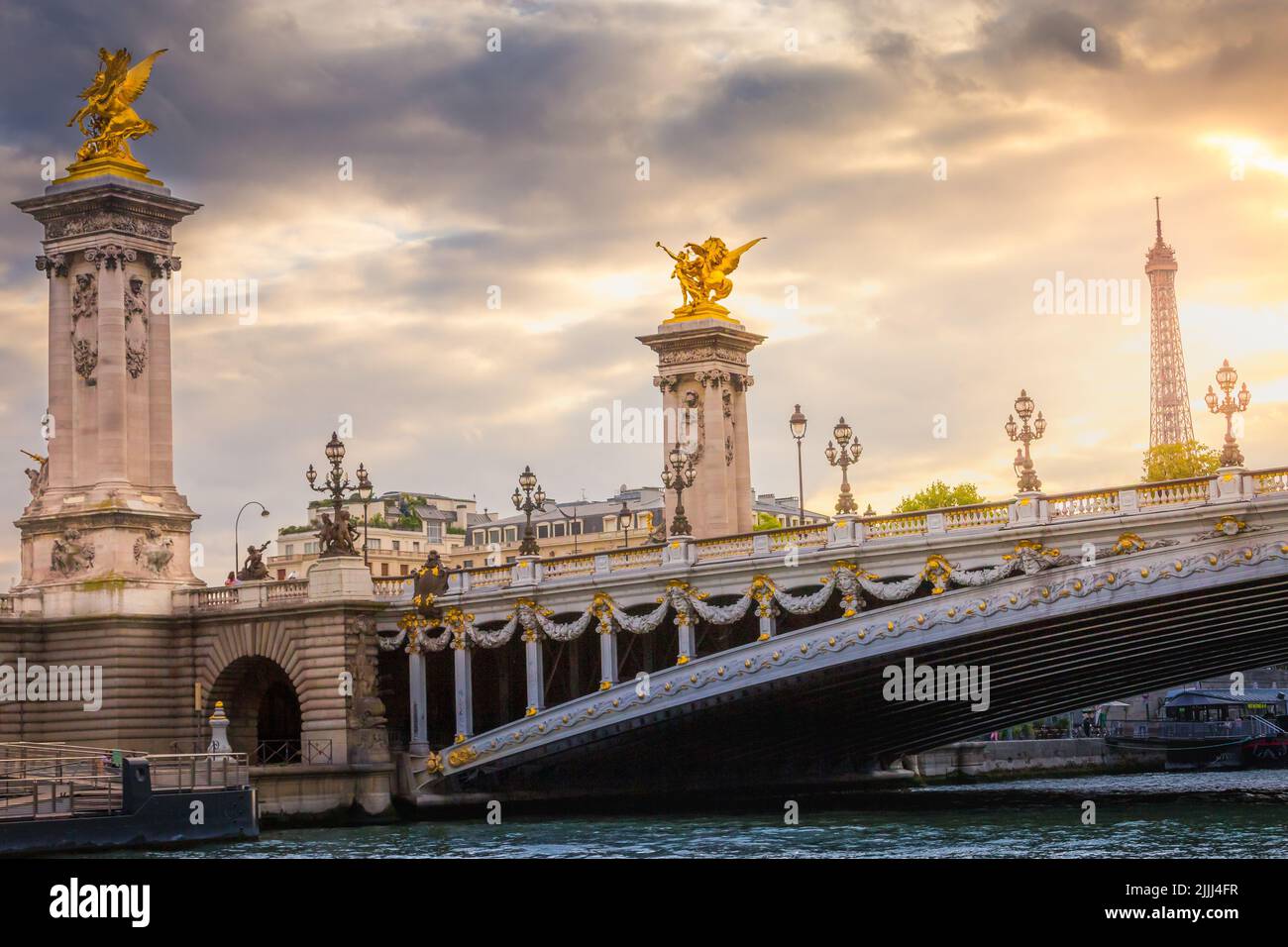 Eiffel Tower and Pont Alexandre III at dramatic sunset, Paris, france ...