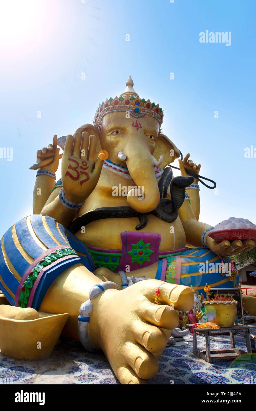 Beautiful Ganesha sitting comfortably outdoors in blue sky is worshiped ...