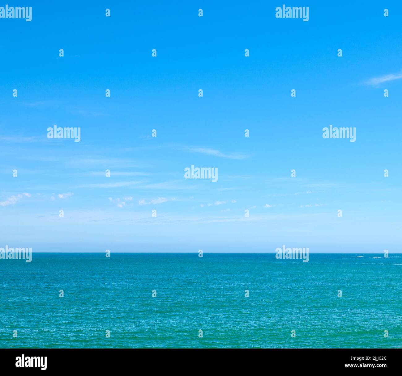 Beautiful, calm and quiet view of the beach, ocean and sea against a ...