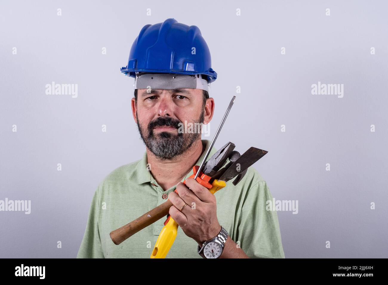Portrait of 60 years old professional heavy industry engineer/worker ...