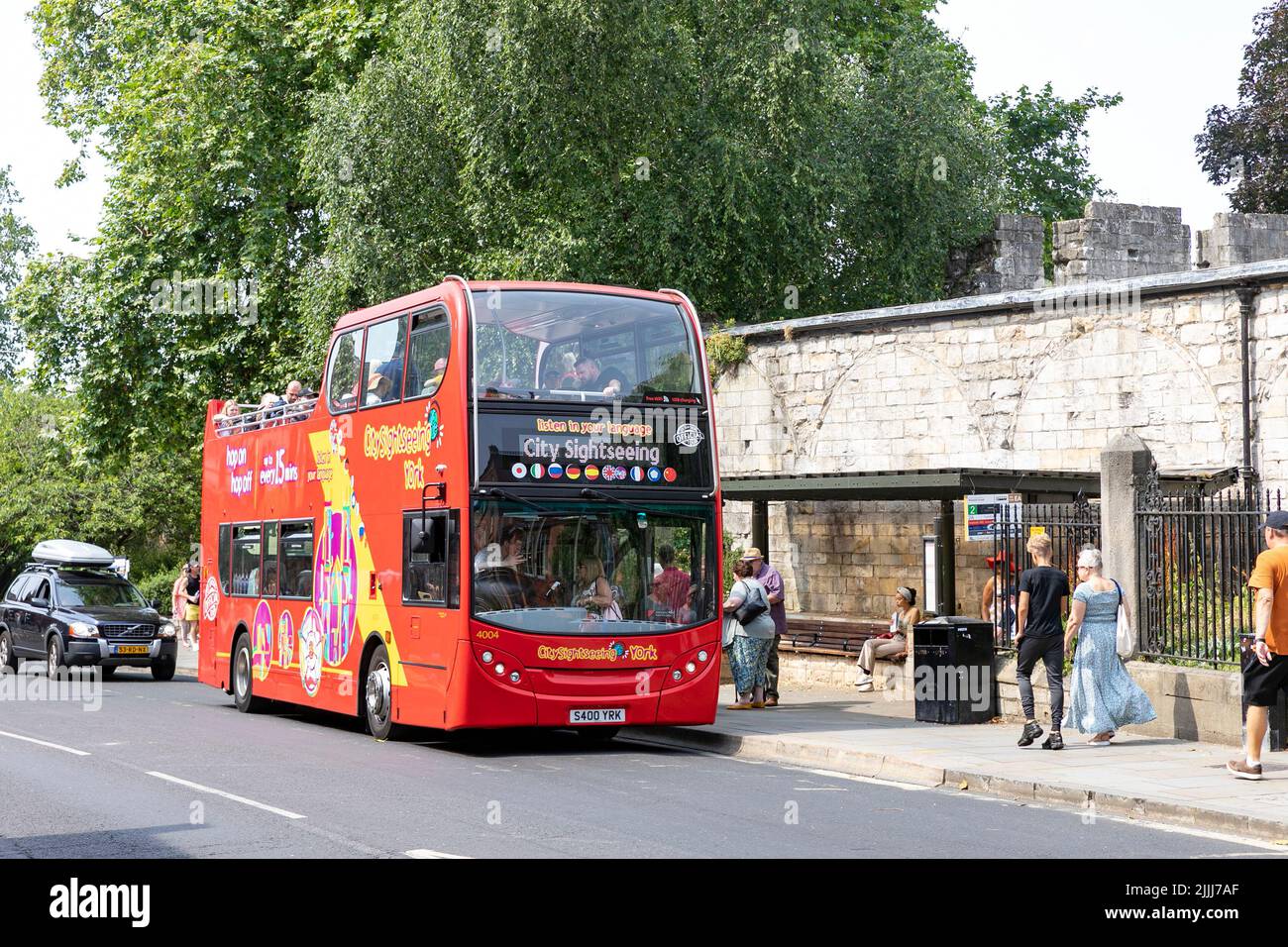 City of York, red double decker sightseeing bus takes visitors around ...