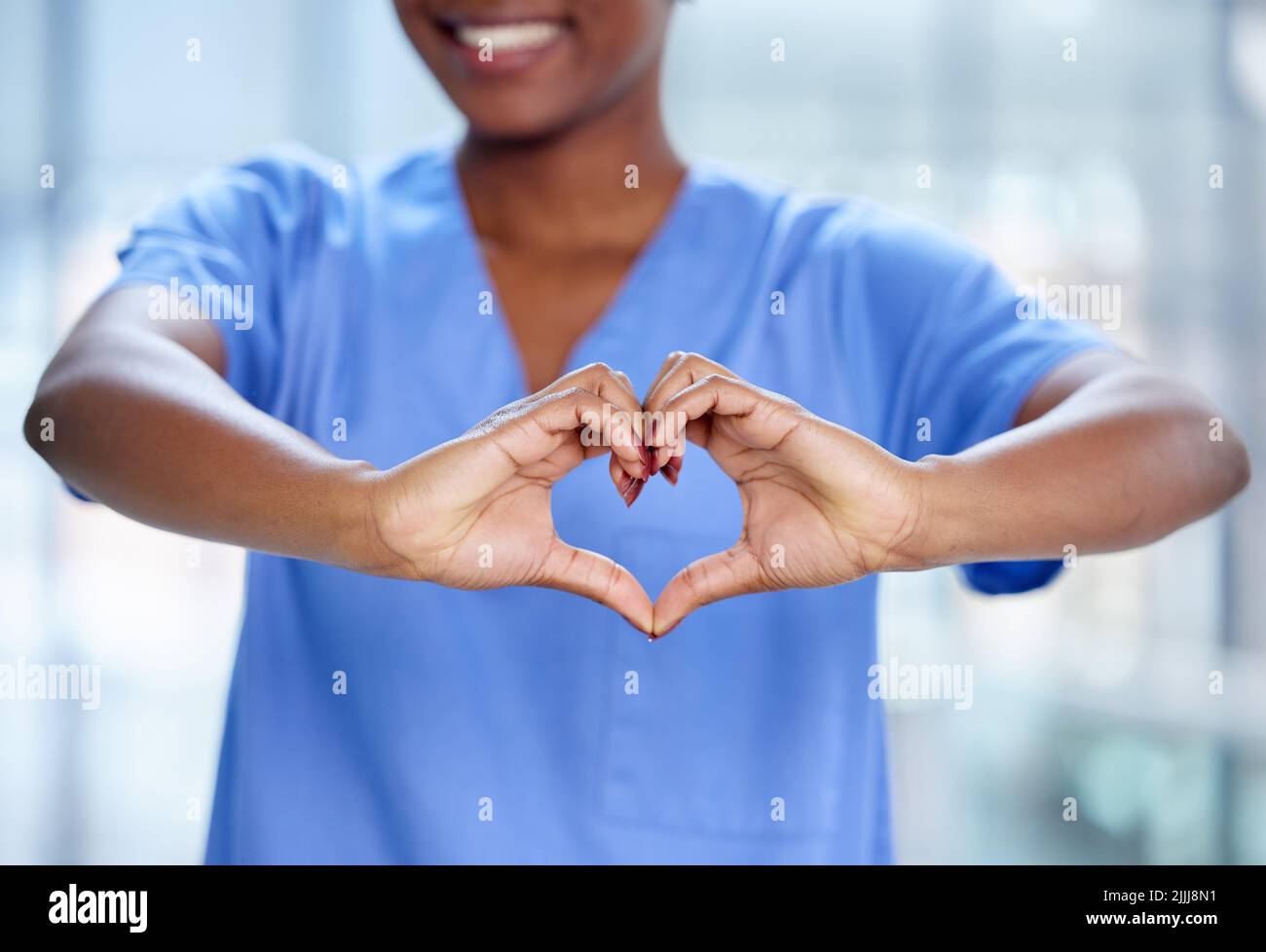 You can trust in me. an unrecognizable doctor making a heart shape with ...