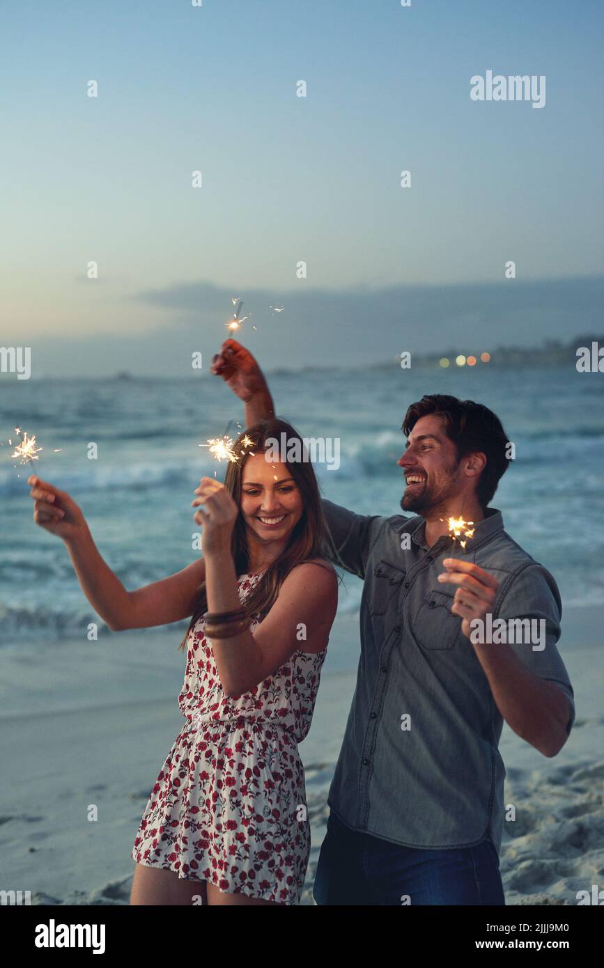 Man holding sparkle hi-res stock photography and images - Alamy