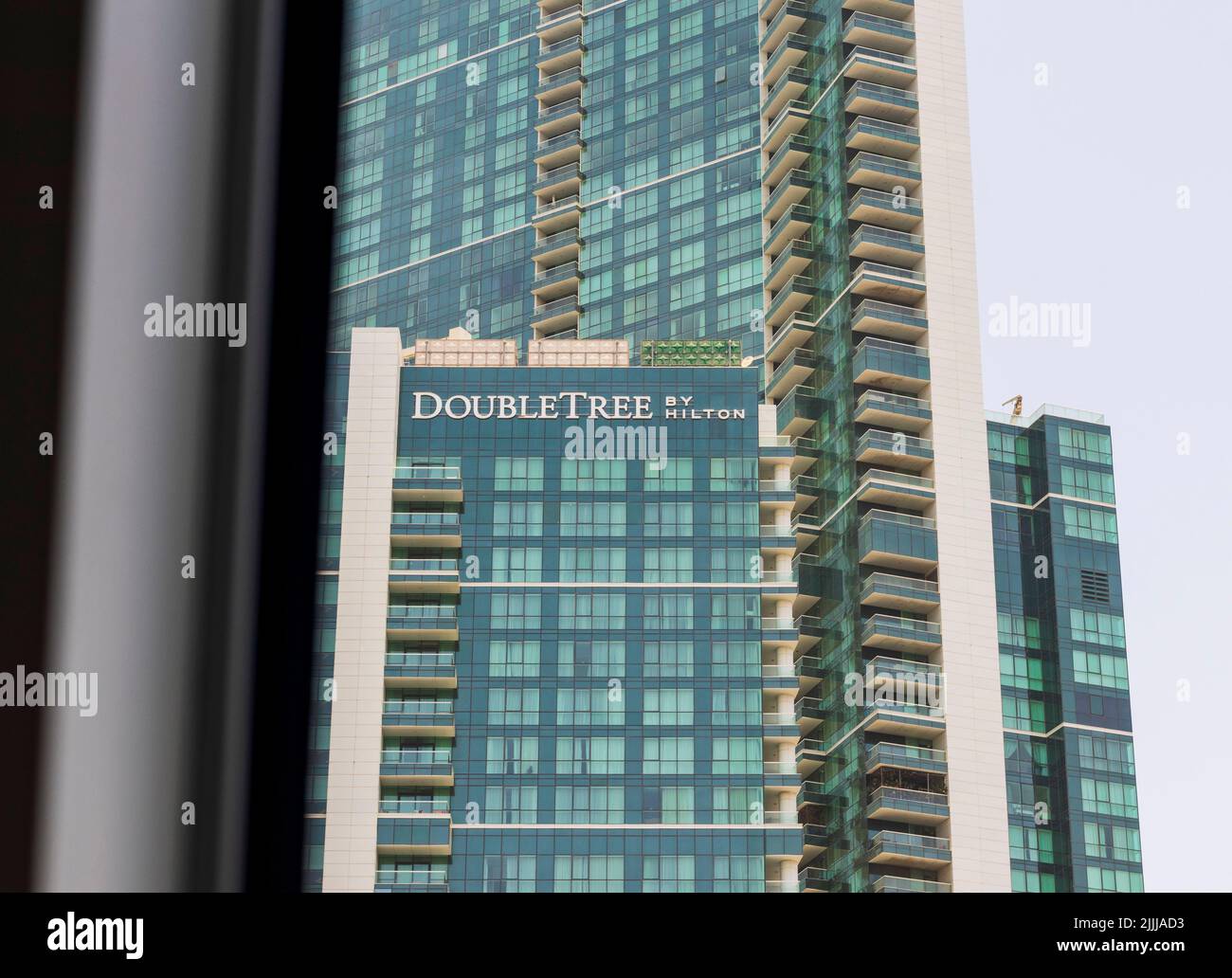 Dubai, UAE - 07.16.2022 View of a Double tree by Hilton hotel in ...