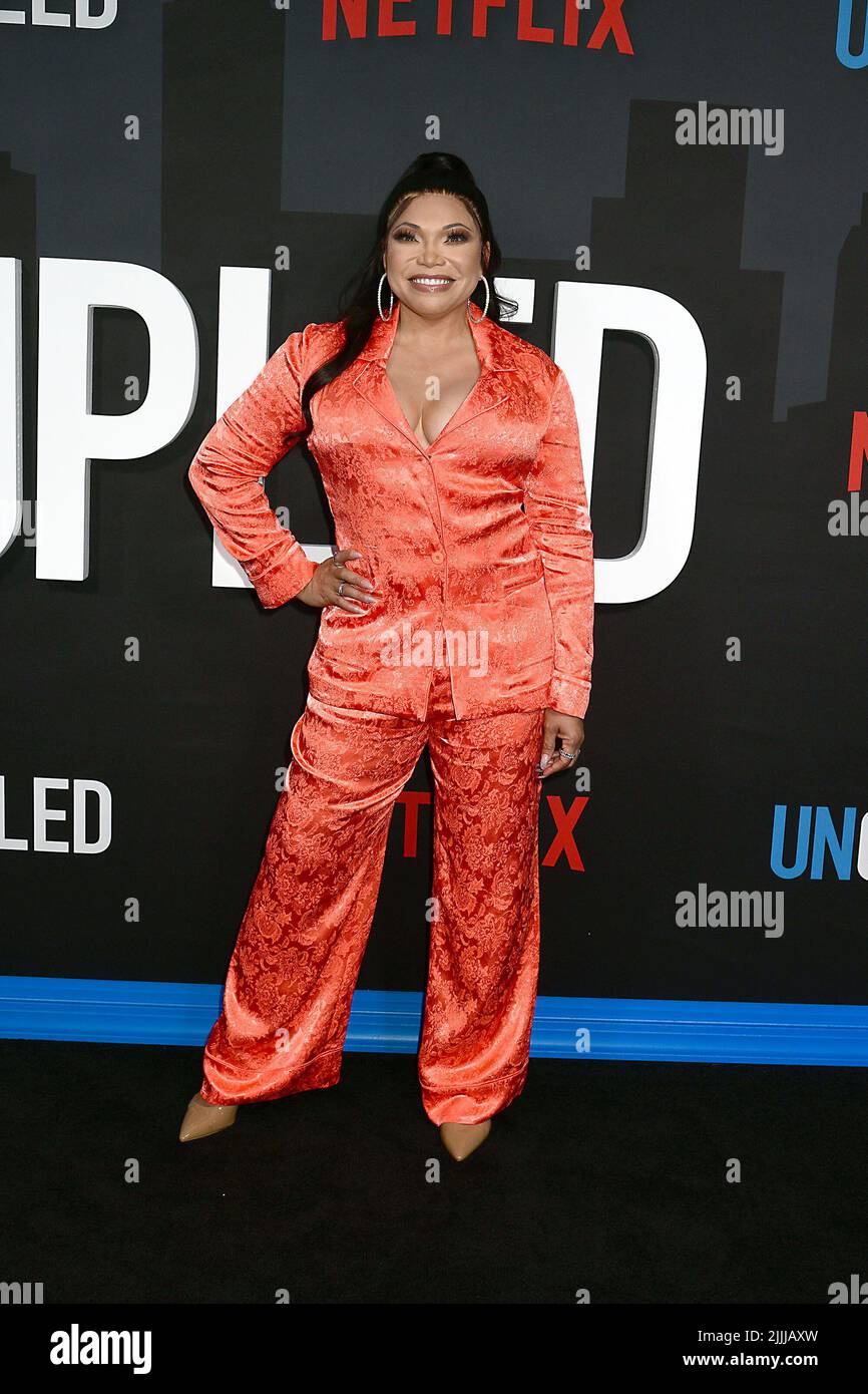 In alice and olivia orange pants suit hi-res stock photography and ...