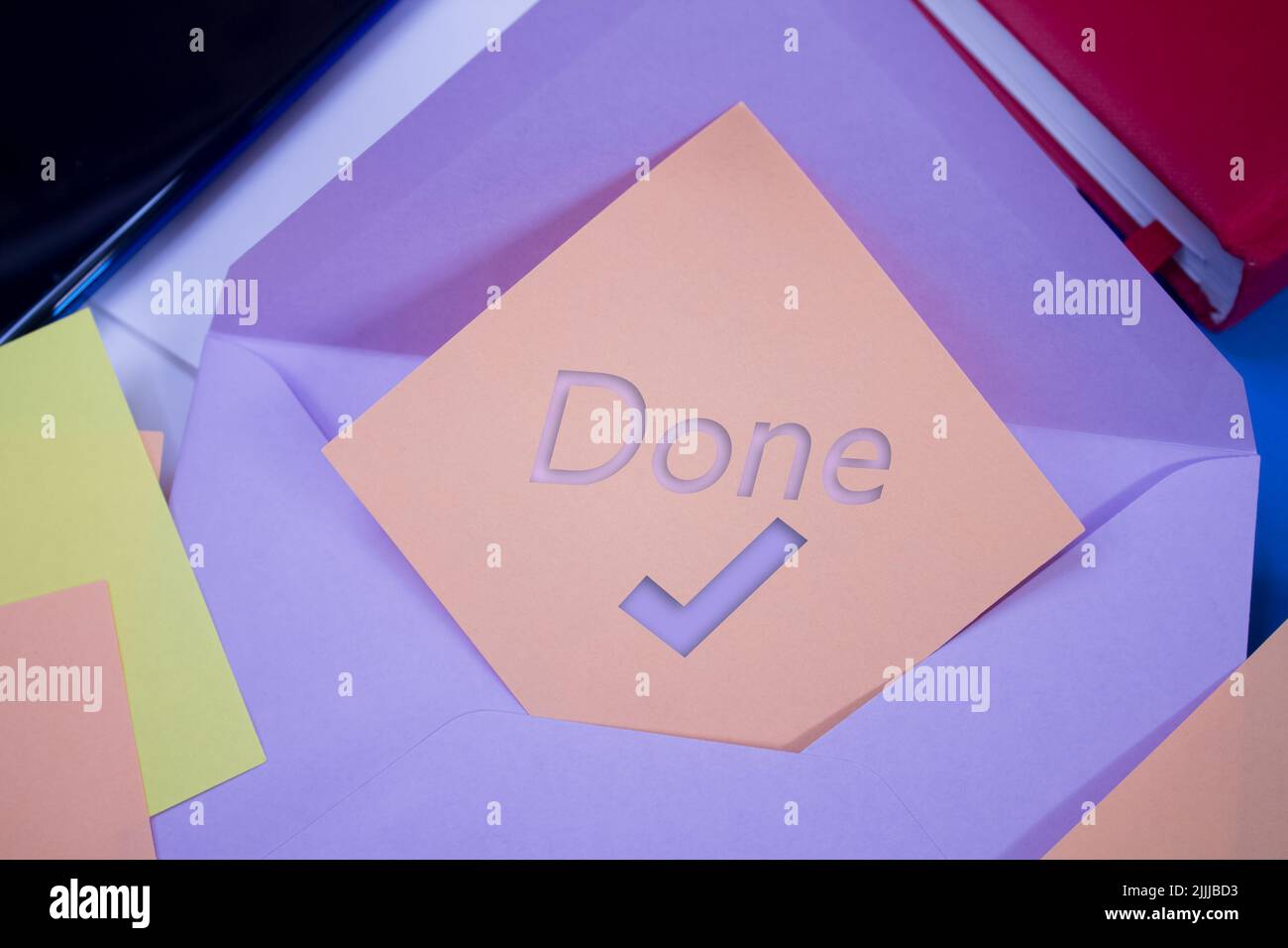 Done text with Checkmark. Text on adhesive note paper. Event ...