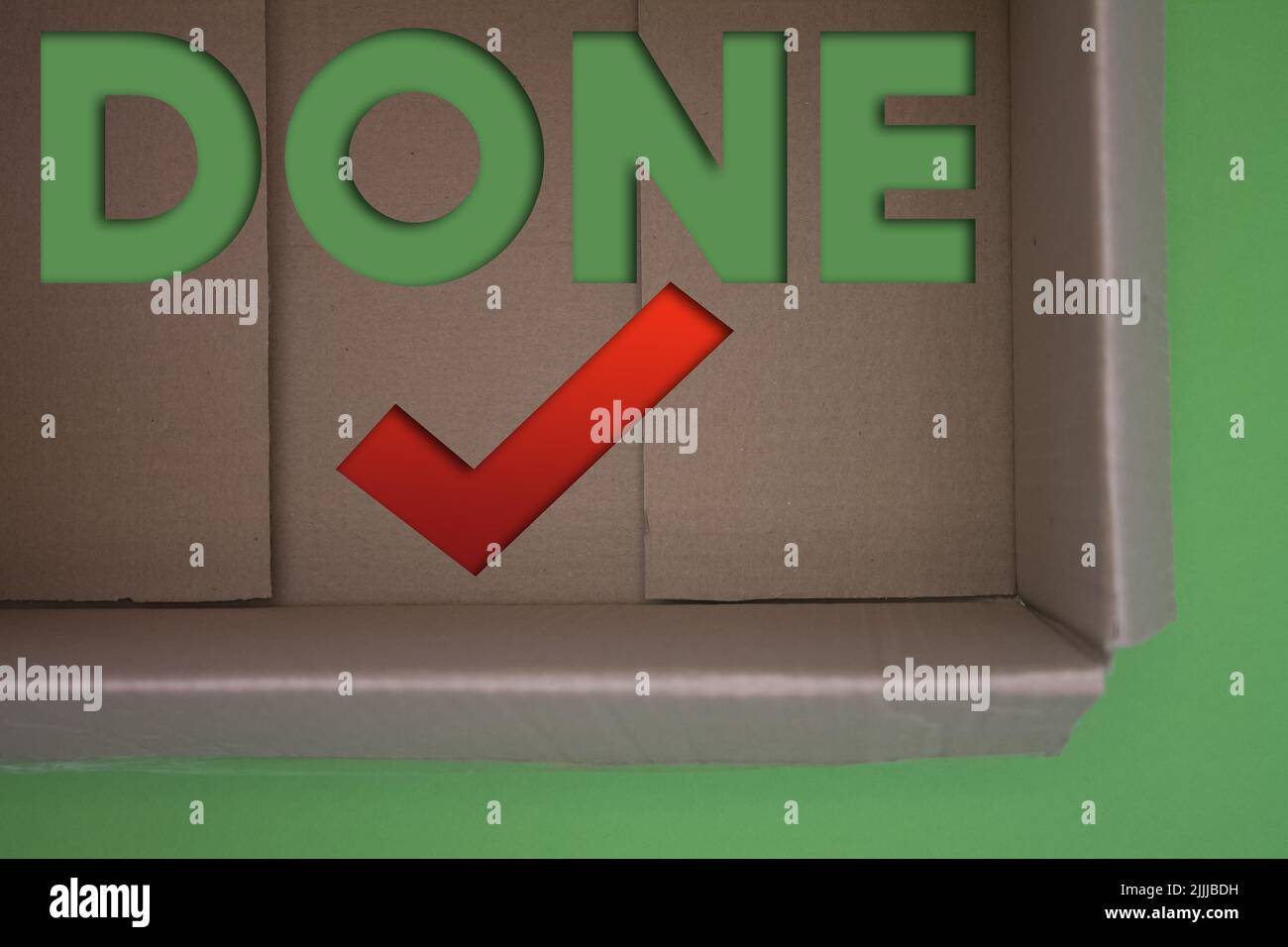 Done text with Checkmark with cardboard box. Brown folded cardbox Stock ...