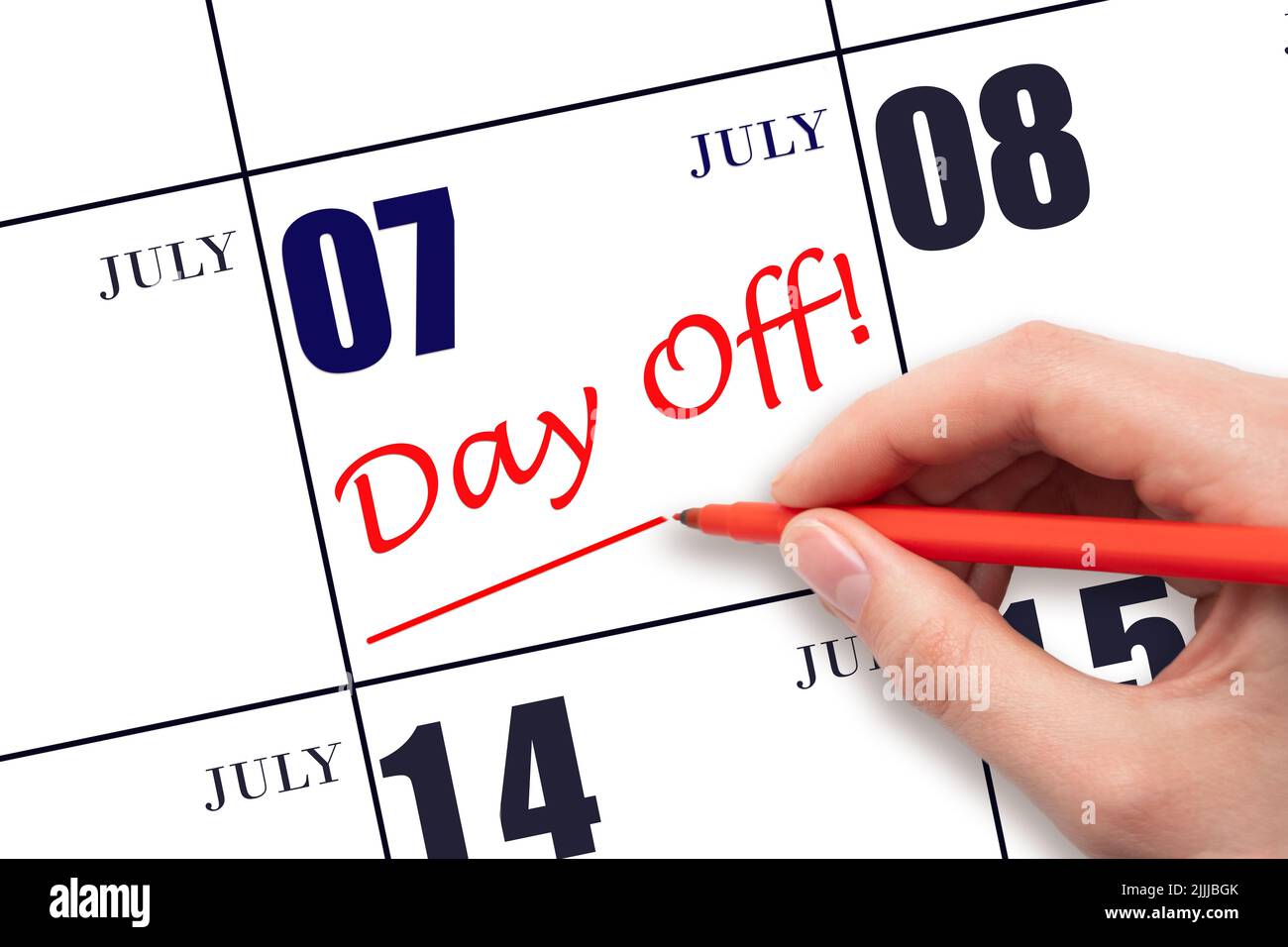 7th day of July. Hand writing text DAY OFF and drawing a line on ...