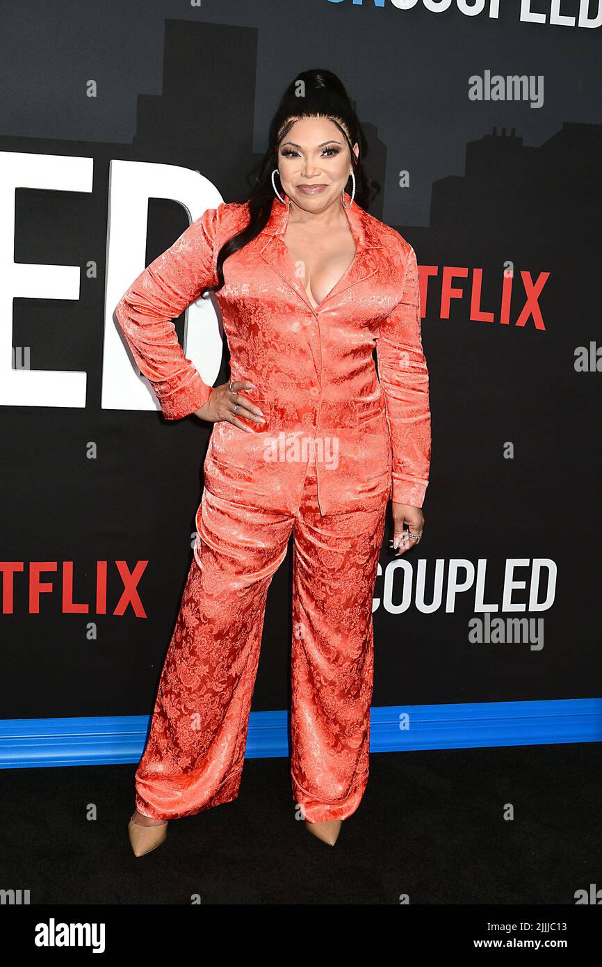 In alice and olivia orange pants suit hi-res stock photography and ...