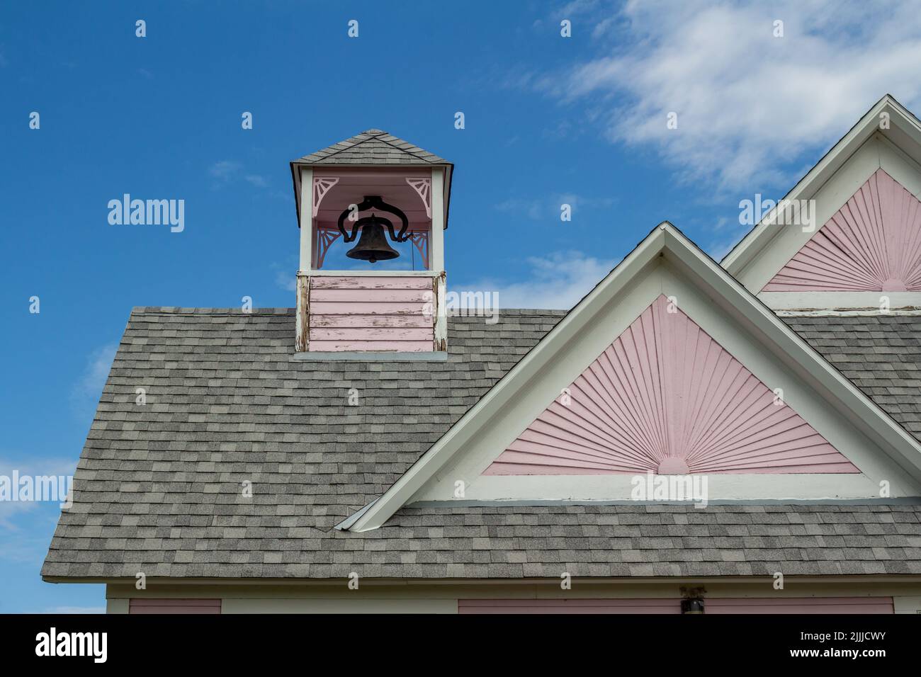 Landscape view of an old historic pink country school house exterior ...
