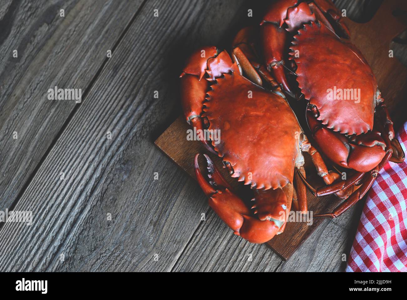 fresh crab on wooden cutting board, seafood crab cooking food boiled or ...