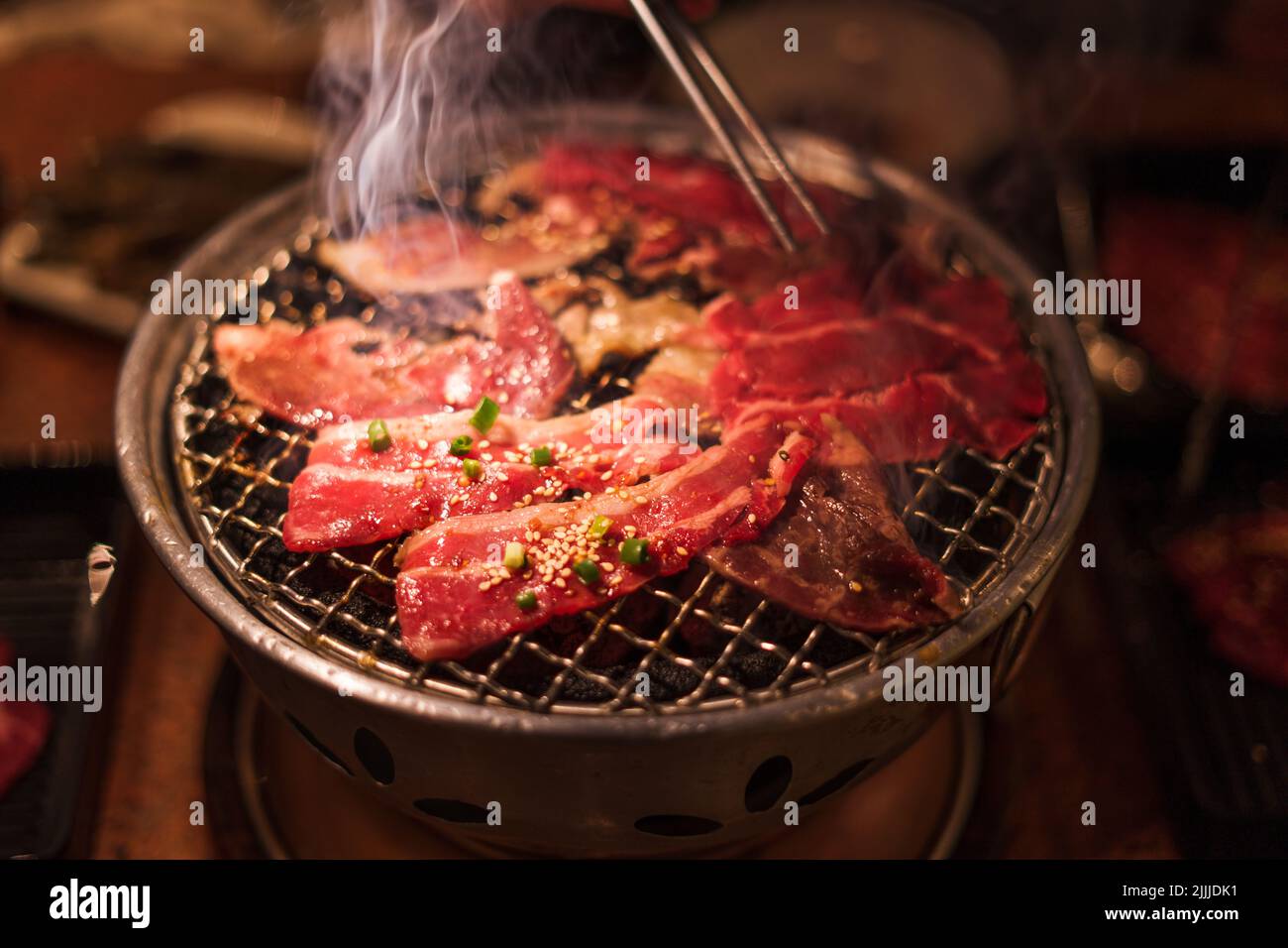 Grilling wagyu beef on charcoal grill ,Japanese barbecue roaster Stock ...