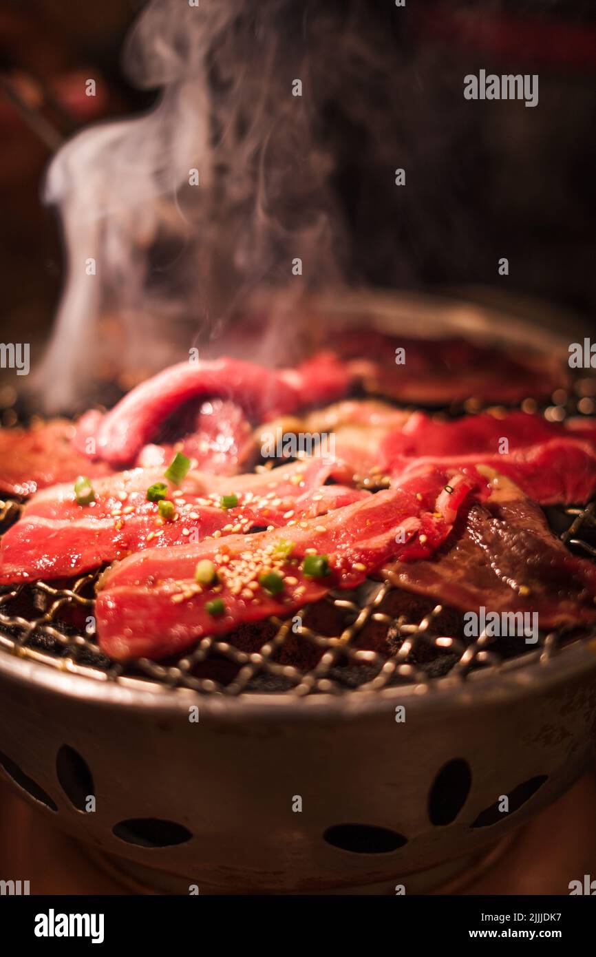 Grilling wagyu beef on charcoal grill ,Japanese barbecue roaster Stock ...