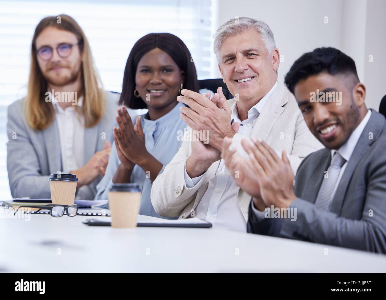 We havent seen work like yours in a while. a group of businesspeople ...