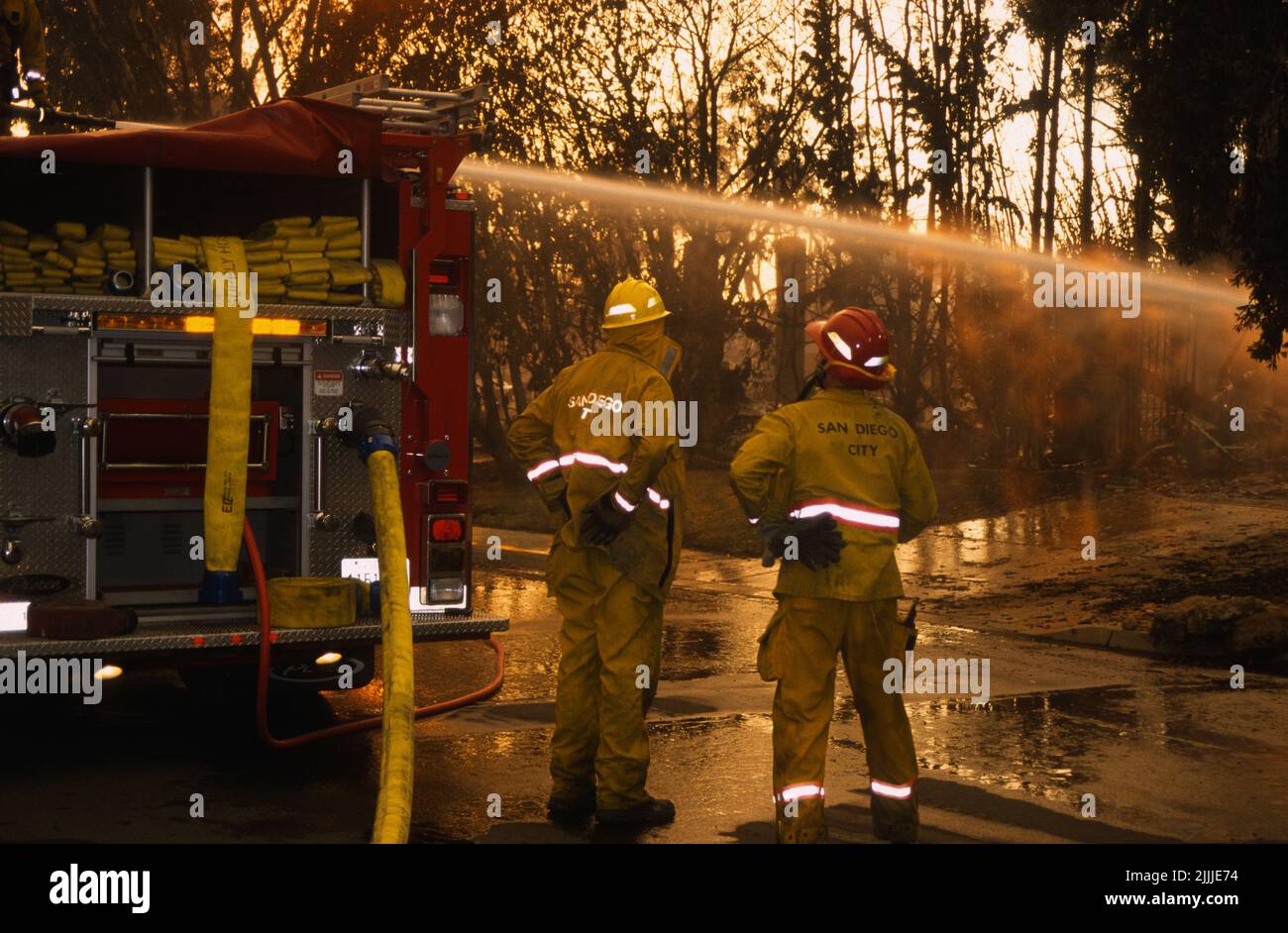 San Diego Fire-Rescue Engine 12's crew douses hot spots at the Cedar ...