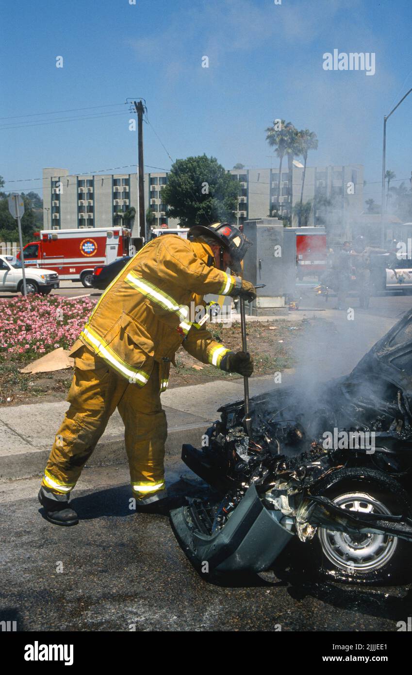 San Diego Fire Department Firefighters working a vehicle fire off ...