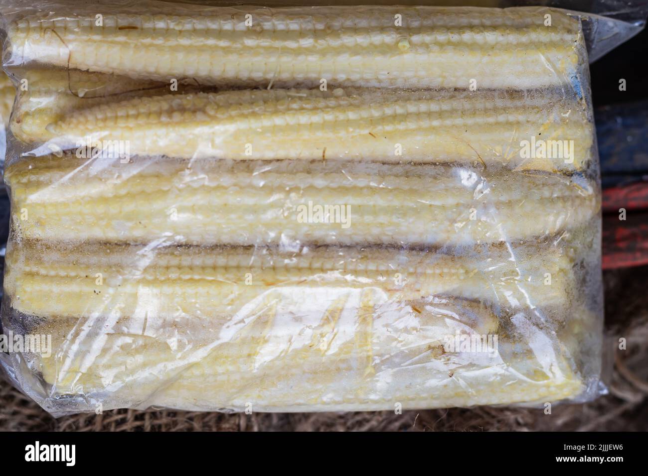 fresh organic baby corn in plastic beg from farm close up shot Stock ...