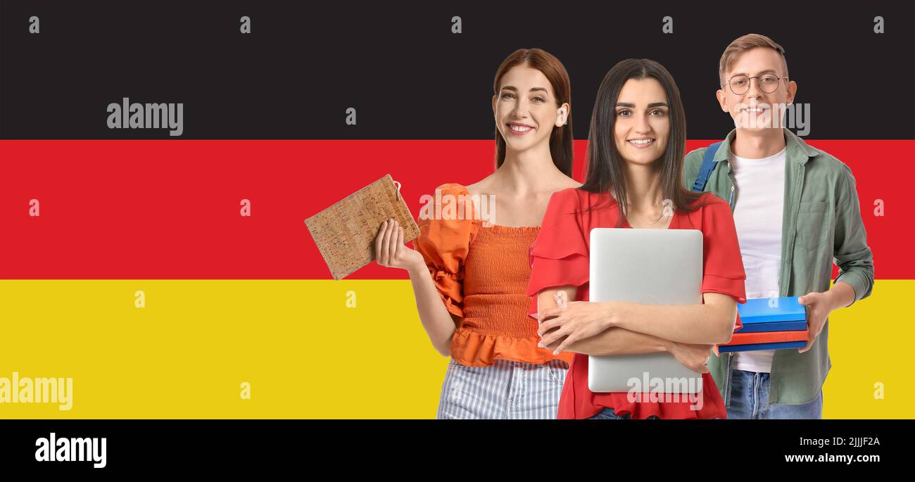 Portrait of students against flag of Germany Stock Photo - Alamy