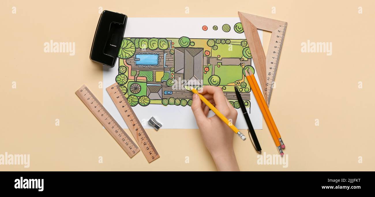 Landscape designer working on residential project, top view Stock Photo ...